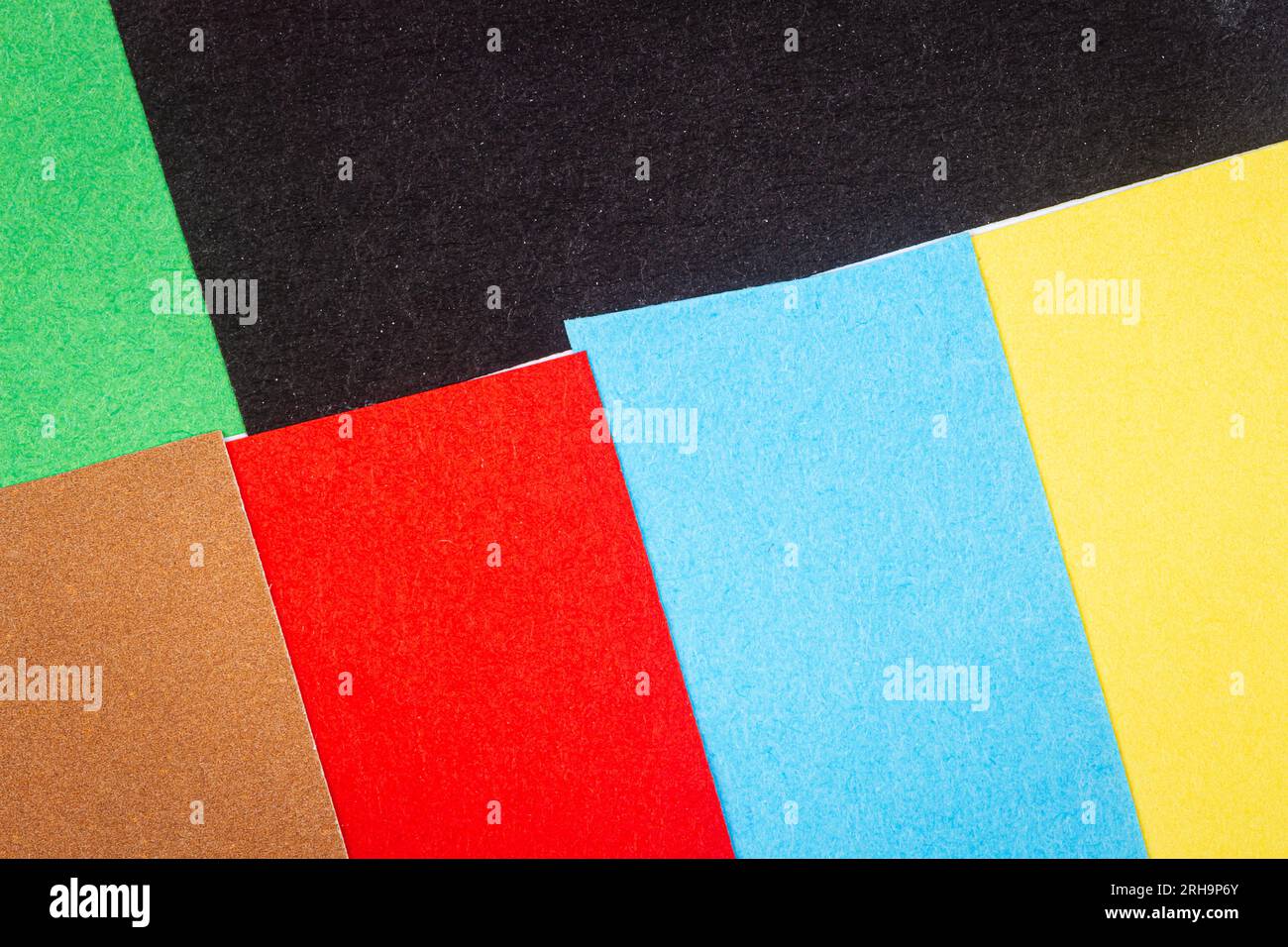 Multicolor background from a paper of different colors. Abstract ...