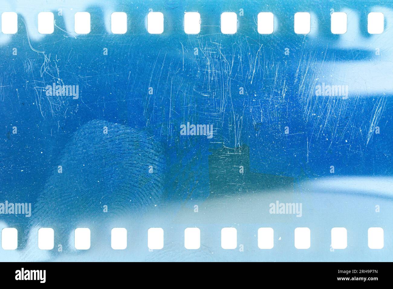 Dusty and grungy 35mm film texture or surface. Perforated scratched ...