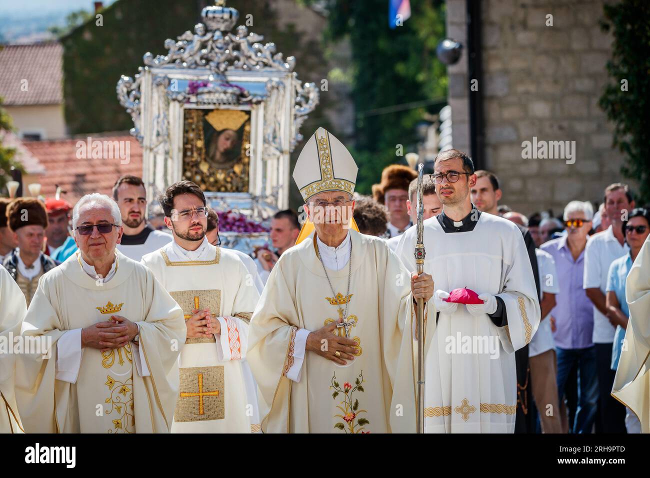 Sinj, Croatia. 15th Aug, 2023. Roman Catholic priests carry The ...