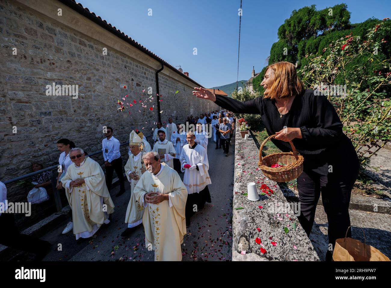 Sinj, Croatia. 15th Aug, 2023. Roman Catholic priests carry The ...