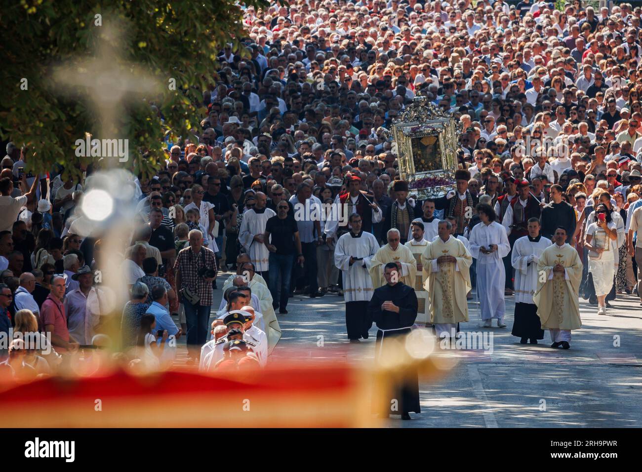 Sinj, Croatia. 15th Aug, 2023. Roman Catholic priests carry The ...