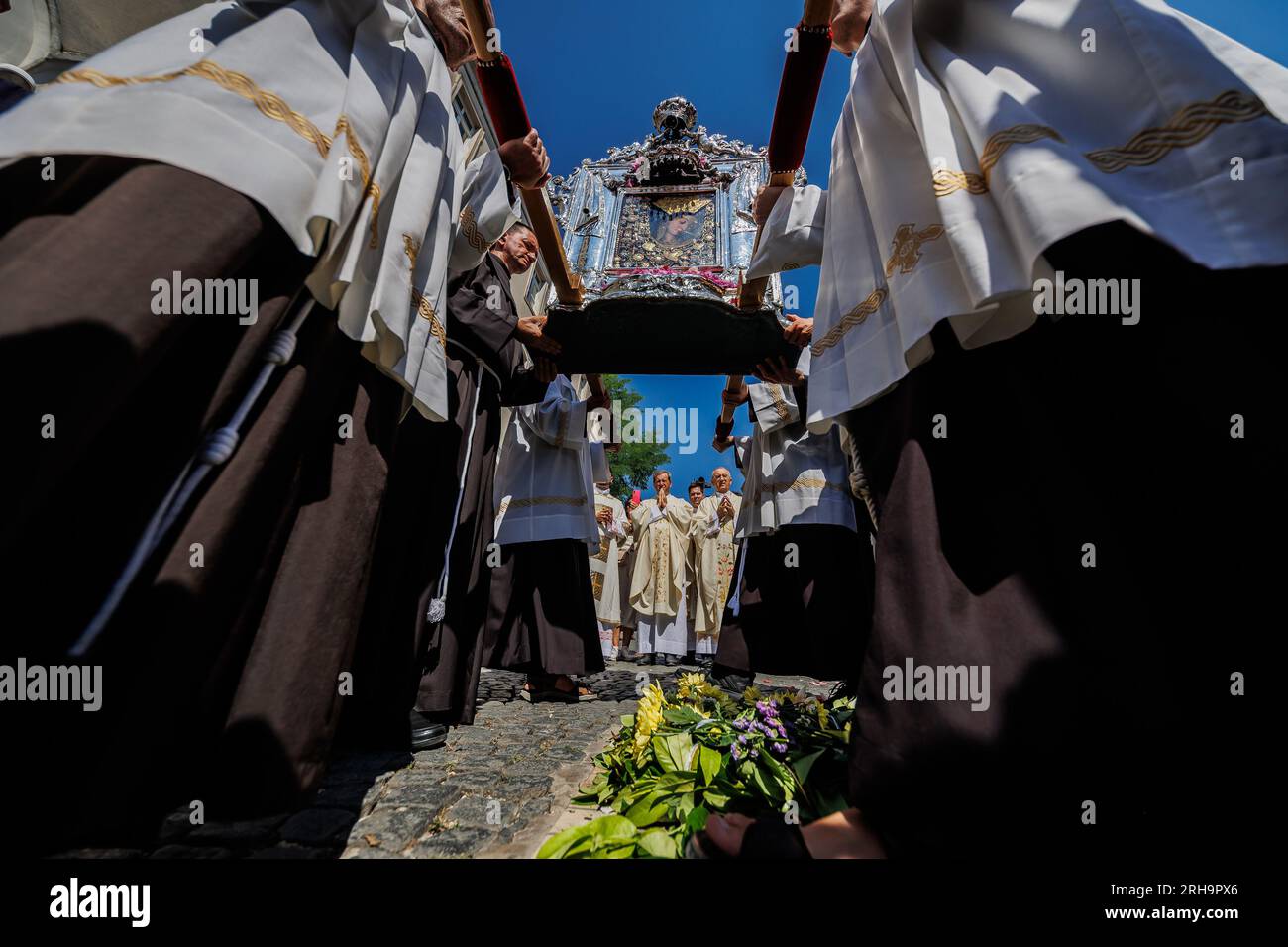 Sinj, Croatia. 15th Aug, 2023. Roman Catholic priests carry The ...