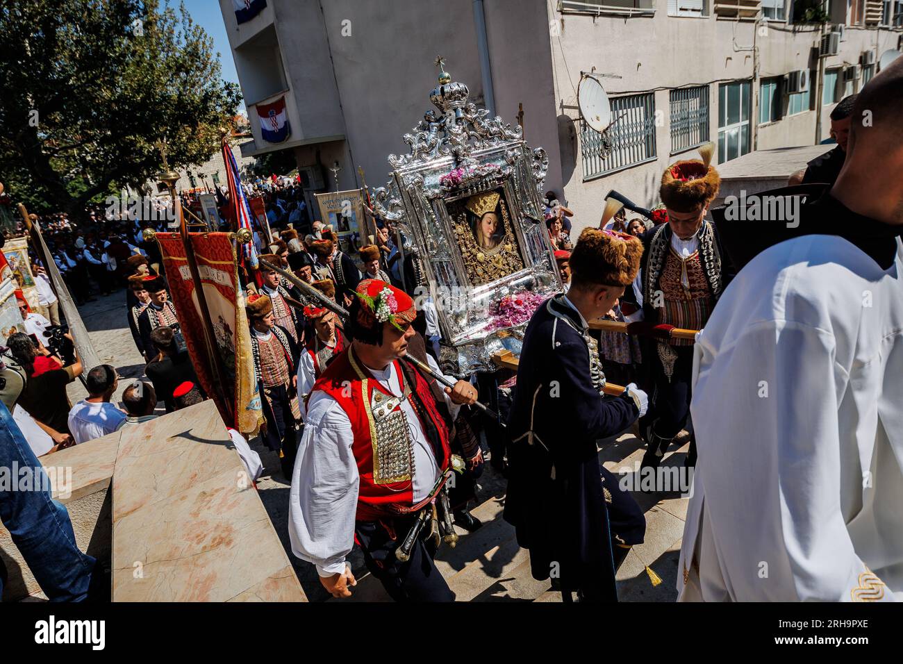 Sinj, Croatia. 15th Aug, 2023. Roman Catholic priests carry The ...
