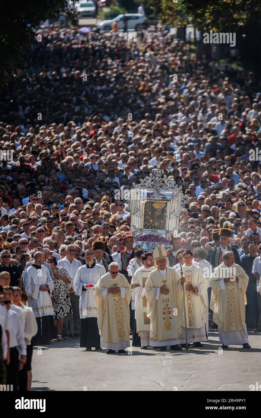 Sinj, Croatia. 15th Aug, 2023. Roman Catholic priests carry The ...