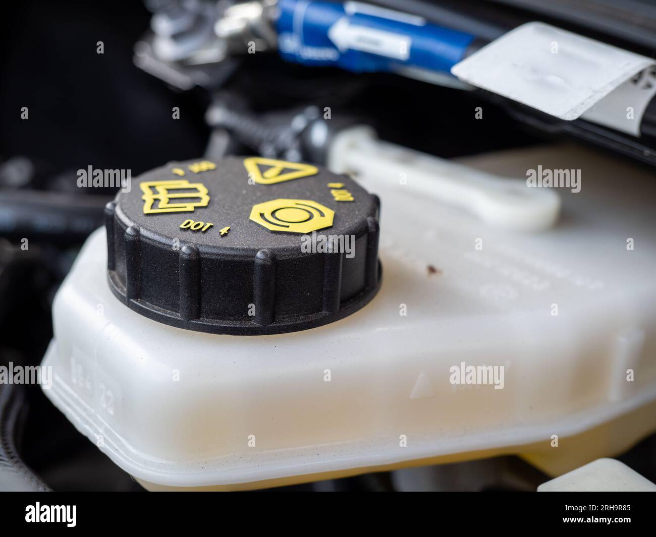 Automotive brake fluid tank. Close-up of the brake fluid reservoir ...