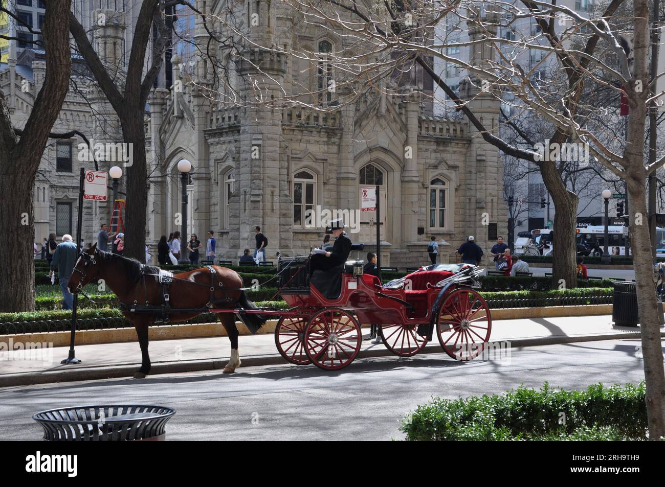 2010-10-08 - Chicago, IL - Two people on horseback pulling carriage in ...