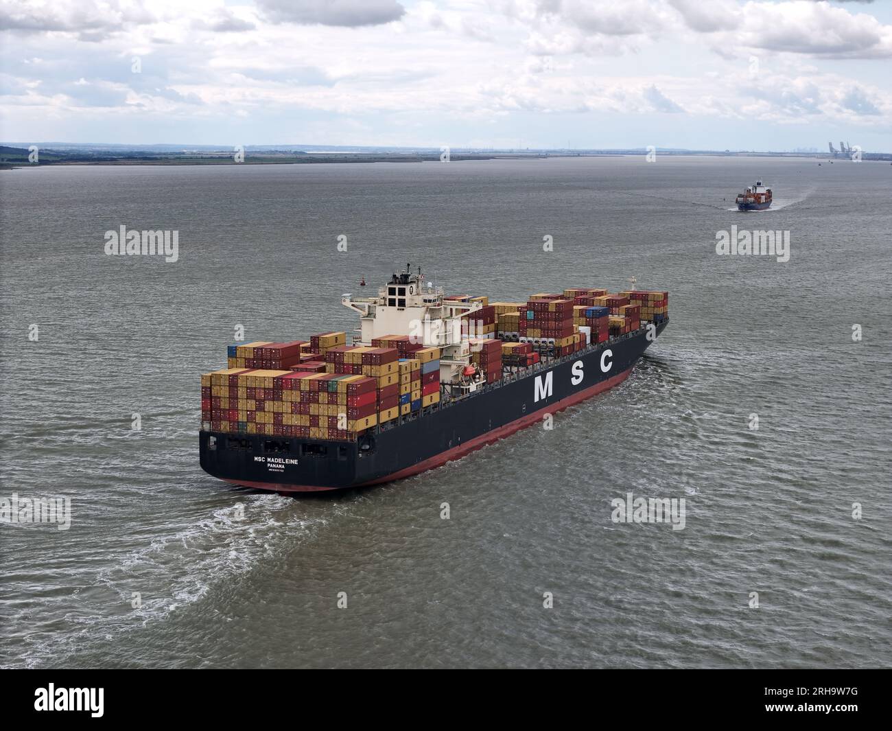 MSC Madeleine container ship sailing passing a outword bound ship ...