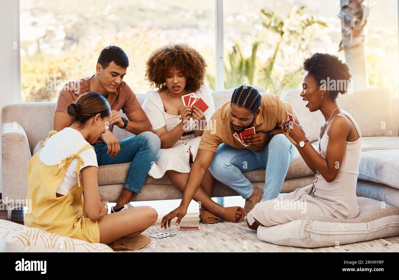 Game, relax or friends playing cards, poker or black jack at home for ...