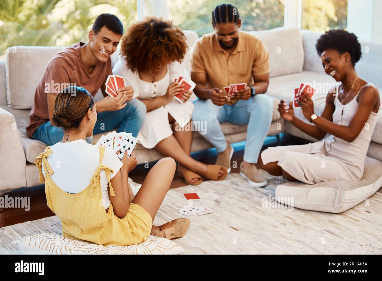 Game, happy or friends playing cards, poker or black jack at home for ...