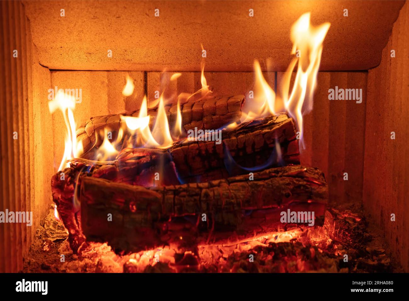 Fireplace close up, fire flame and burning wood logs, warm home in ...