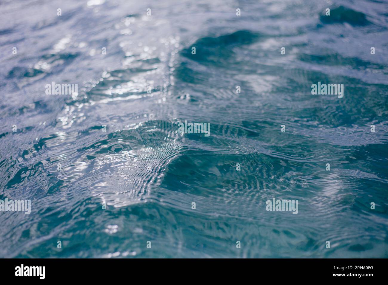 Sparkling waves on the surface of the Caribbean ocean in St. John, USVI ...