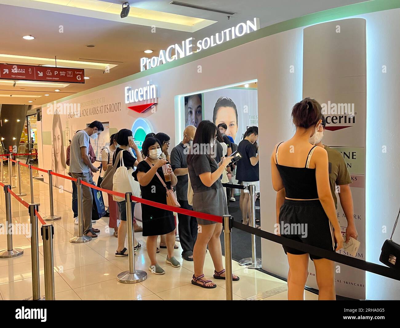 Malaysians queue for Eucerin ProACNE solution in shopping centre in Kuala Lumpur , Malaysia ...