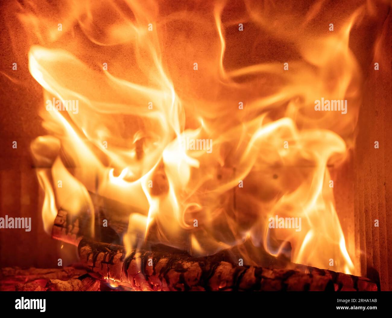 Fire flames and burning wood logs, fireplace close up, Warm home in ...