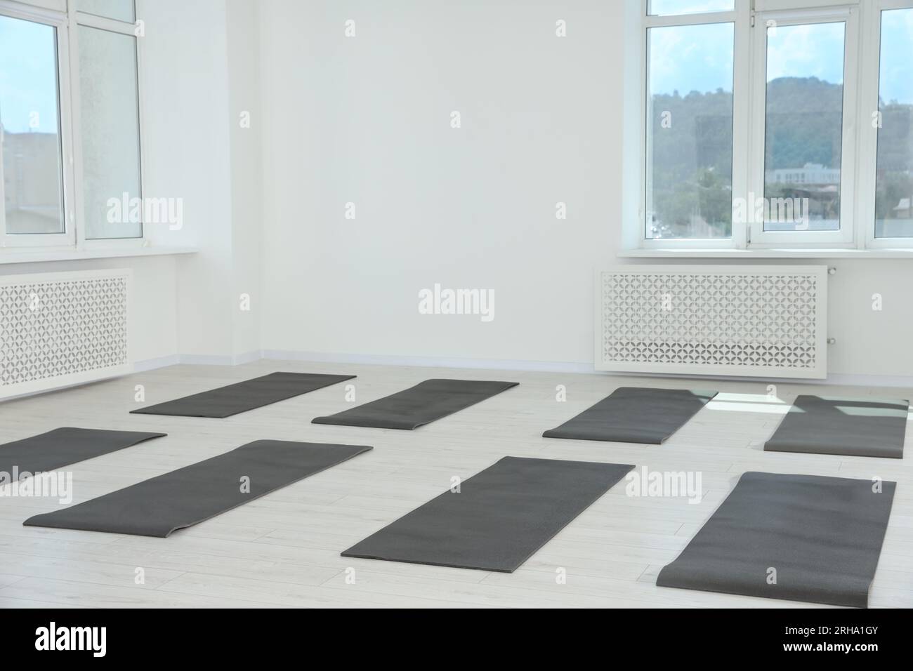 Empty yoga studio mats hi-res stock photography and images - Alamy