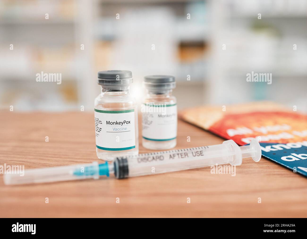 Pharmacy, syringe and vial of vaccine for cure, medication or monkeypox ...