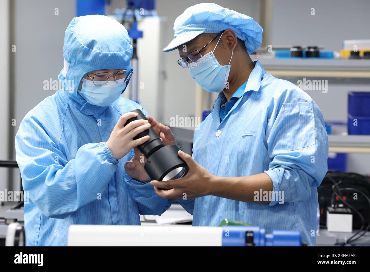 FUZHOU, CHINA - AUGUST 15, 2023 - Workers produce industrial machine ...