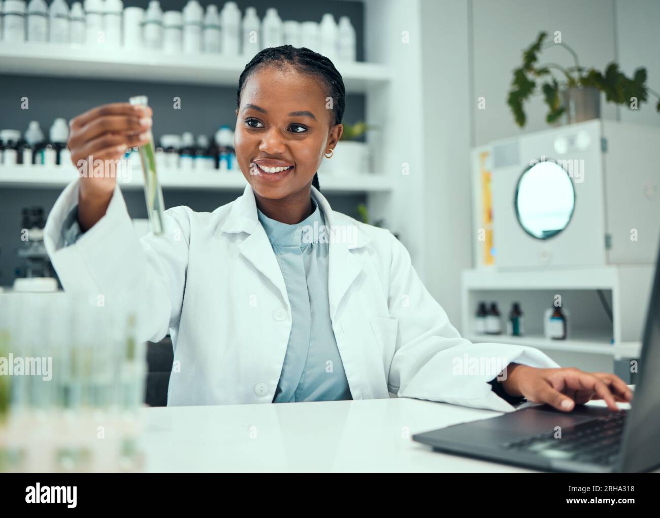 Science lab, black woman and smile for test tube plant grow ...