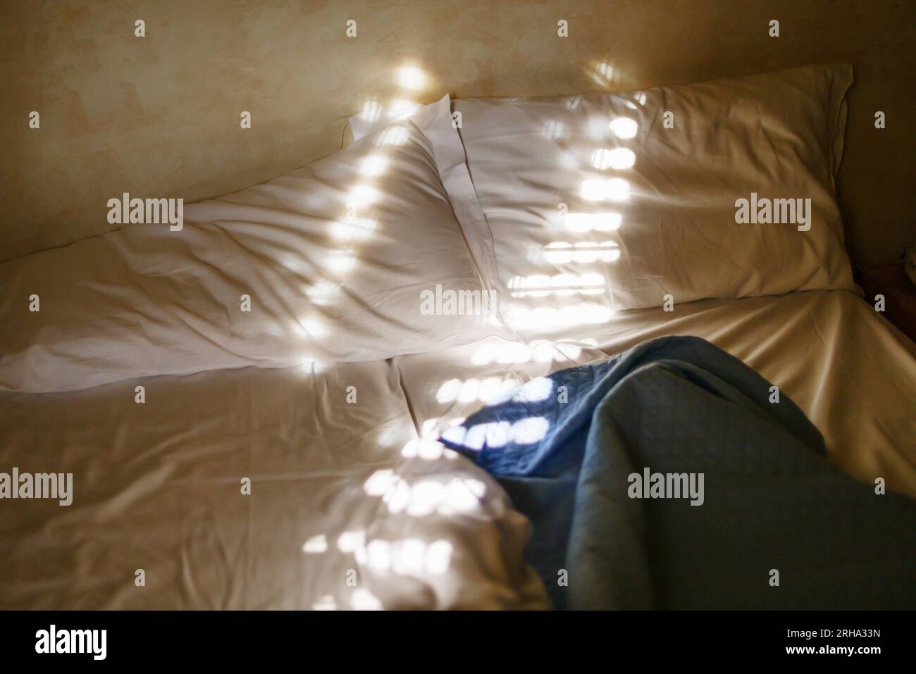 crumpled pastel after sleep with rays of the sun Stock Photo - Alamy