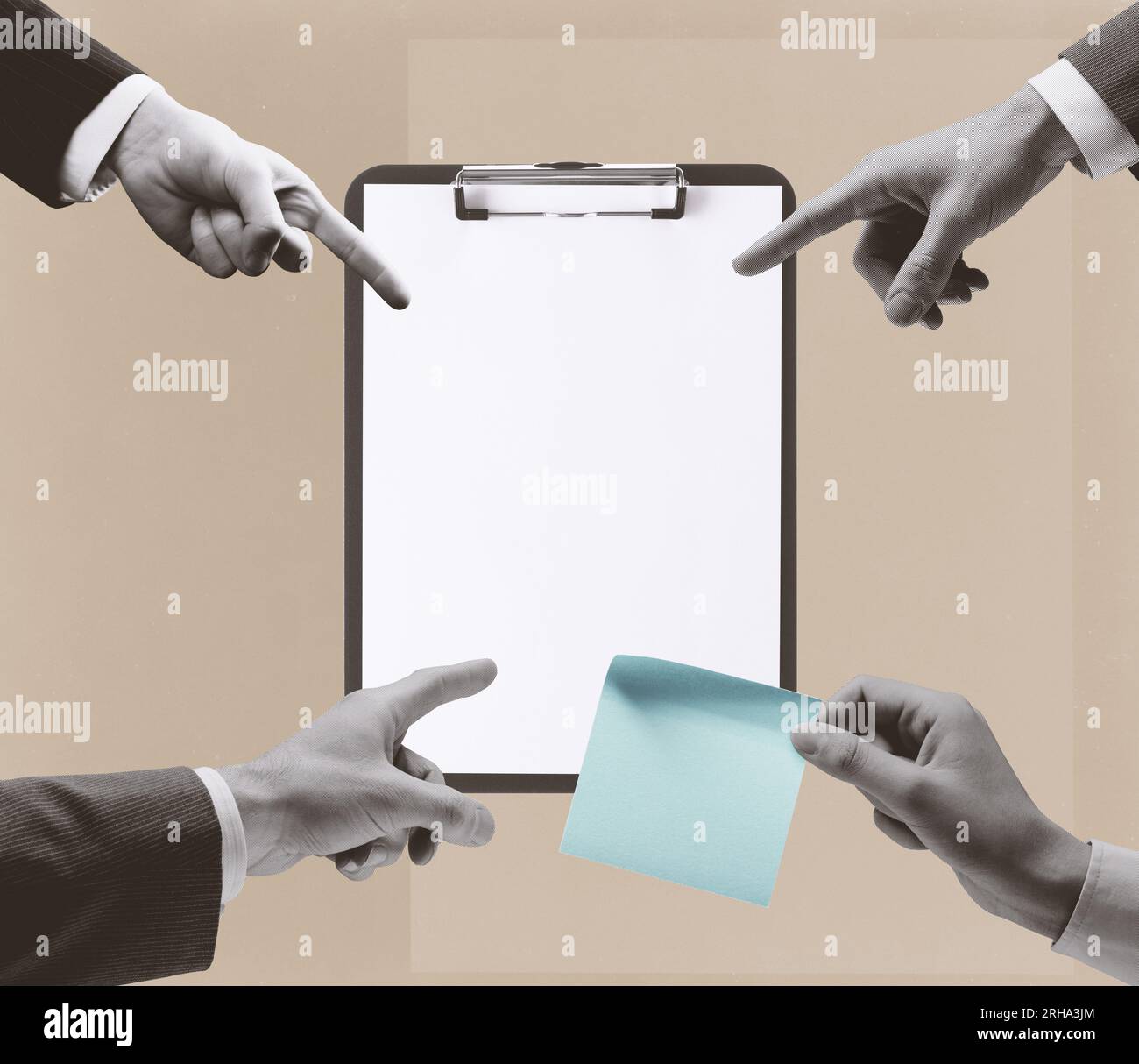 Corporate business people working together and pointing at a blank ...