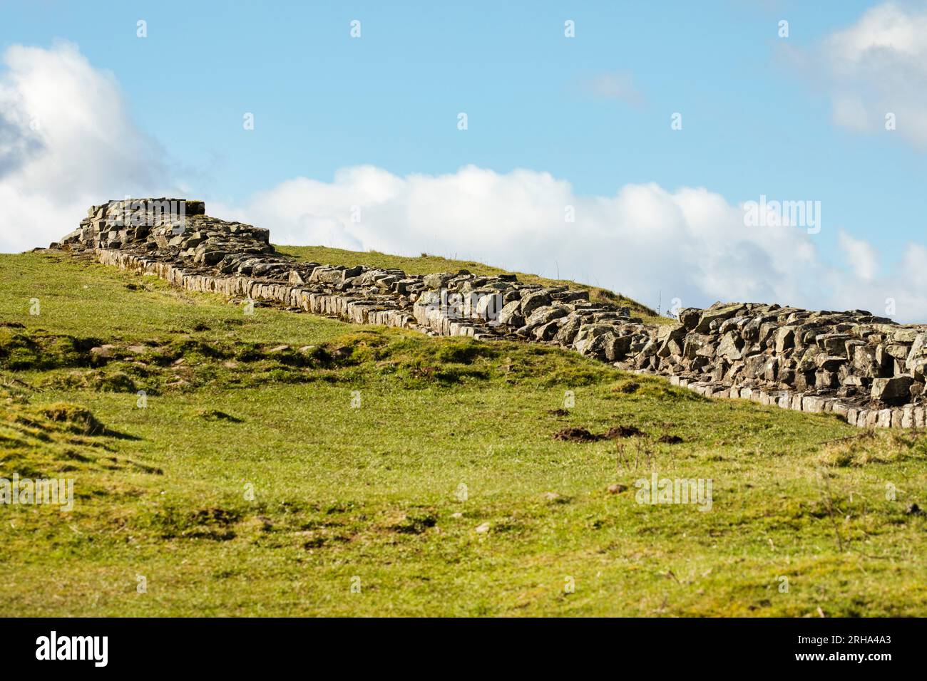Hadrian's Wall as it follows the line of the Whin Sill and hills ...
