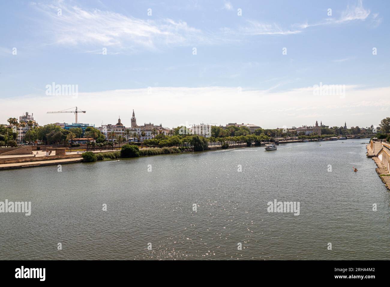 Seville, Spain. Views of the Guadalquivir river from the Puente de ...