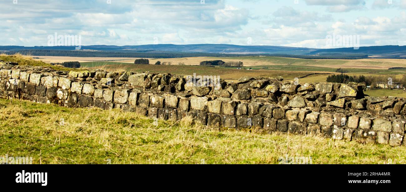 Hadrian's Wall as it follows the line of the Whin Sill and hills ...