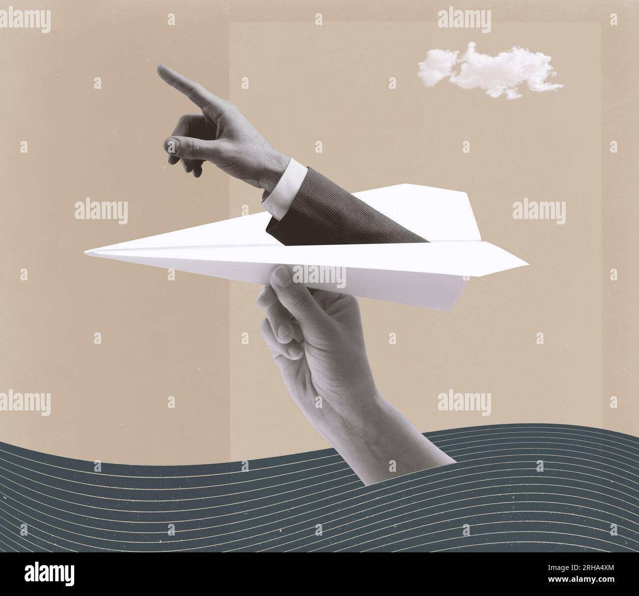Hand launching a paper plane and business executive hand pointing ...
