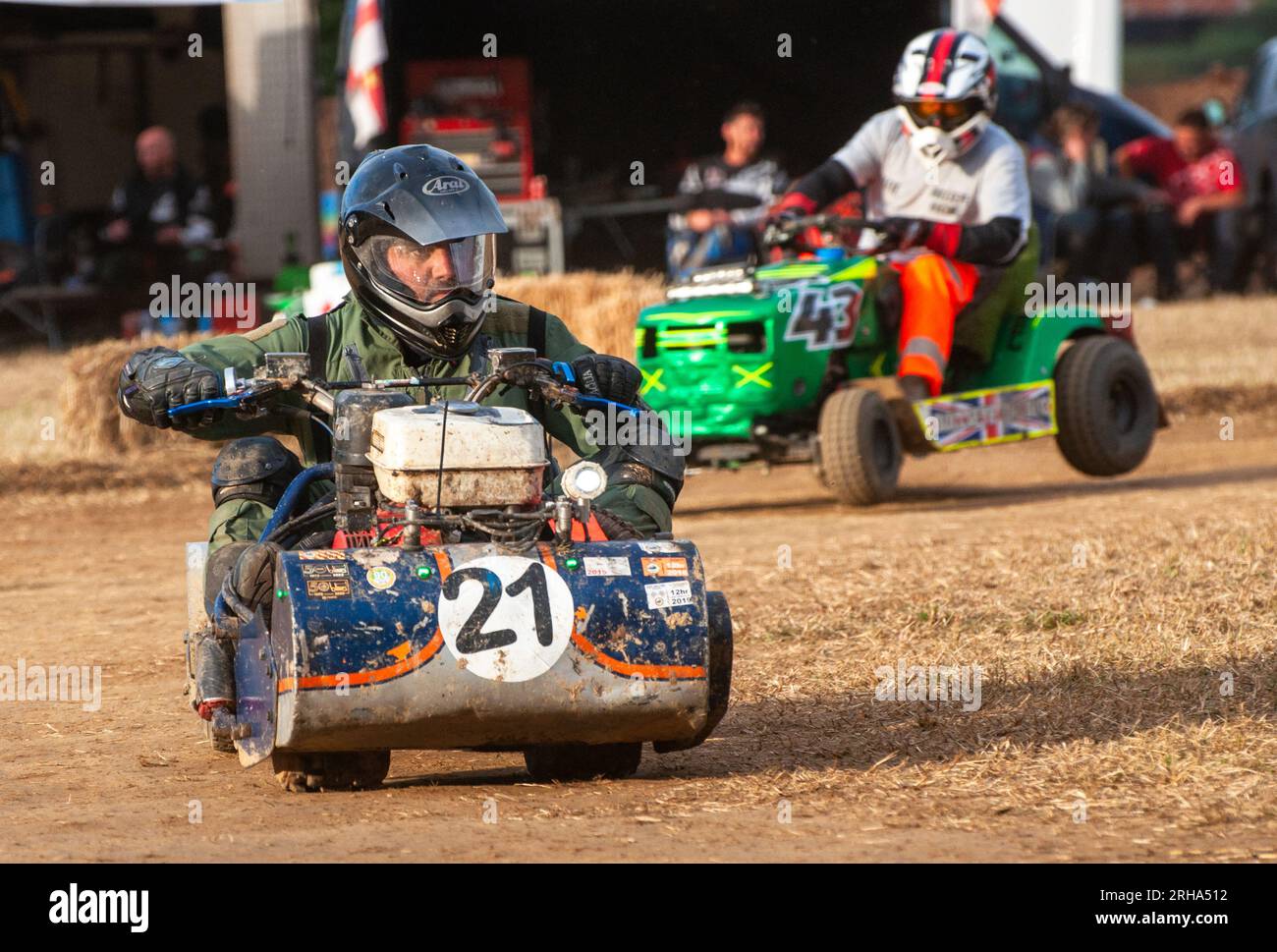 A racing lawn mower driver from the team "Battle of Britain Mow-morial ...