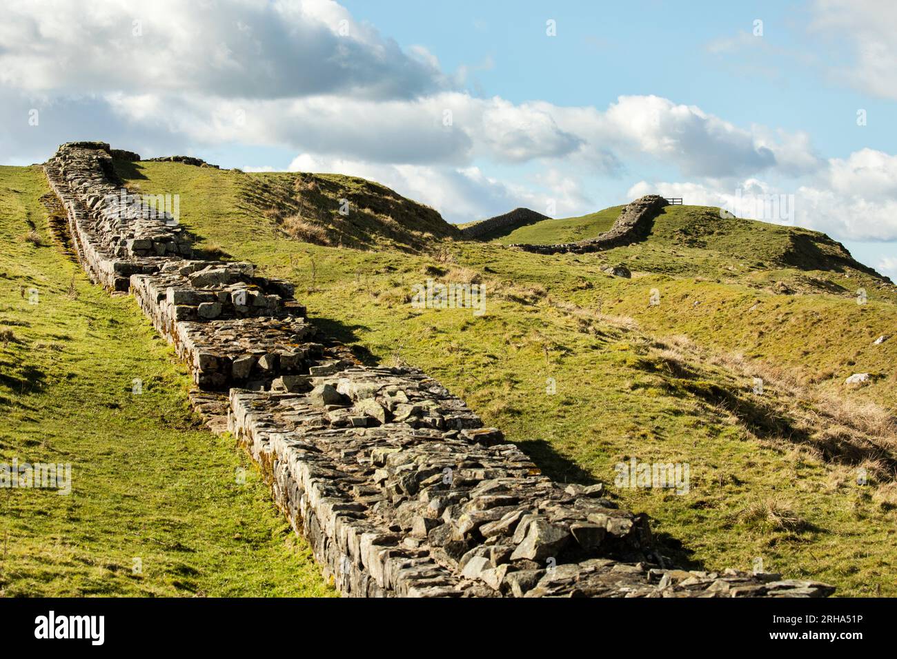 Hadrian's Wall as it follows the line of the Whin Sill and hills ...