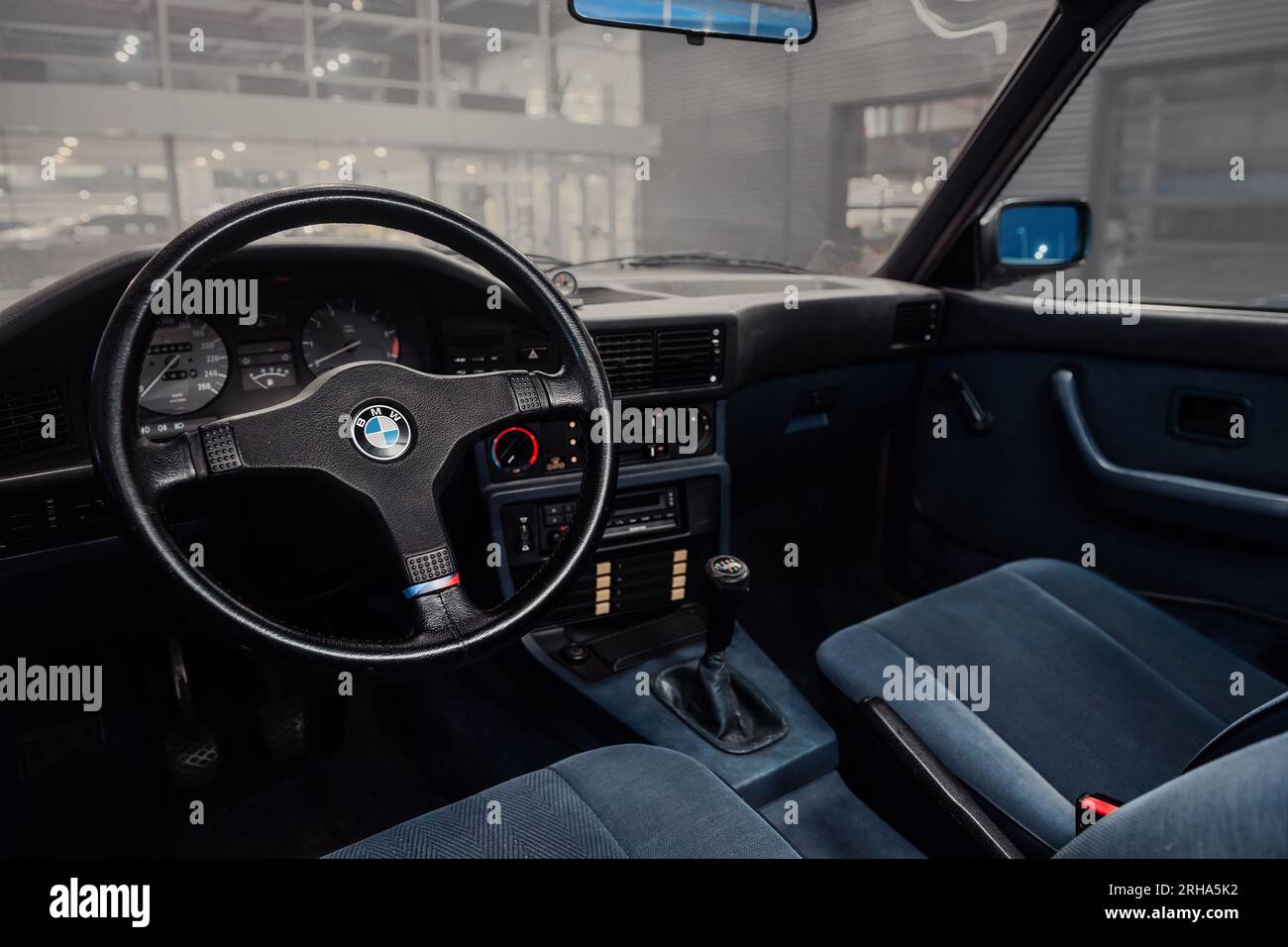 interior of 1980-s BMW E28. Dark blue velour seats in the interior of ...