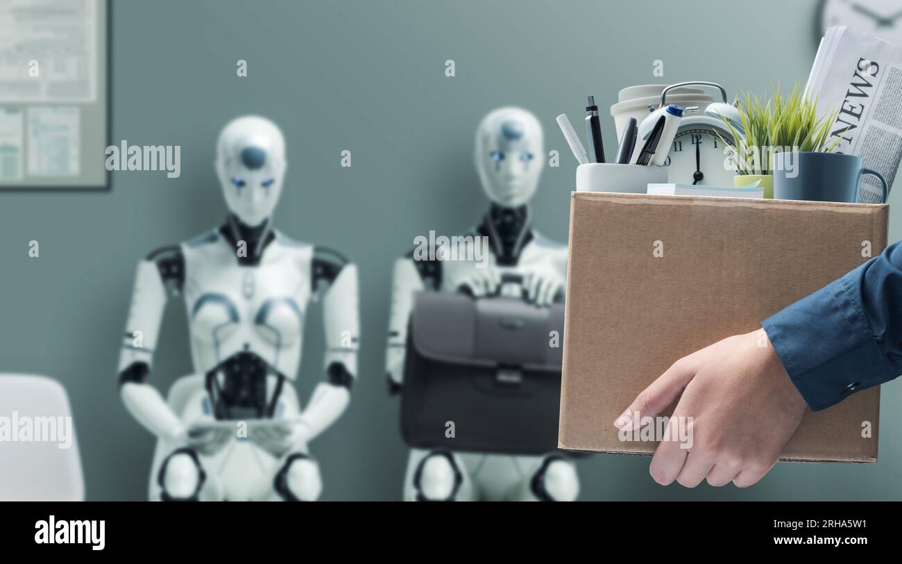 Fired office worker holding a box with her belongings and leaving the ...