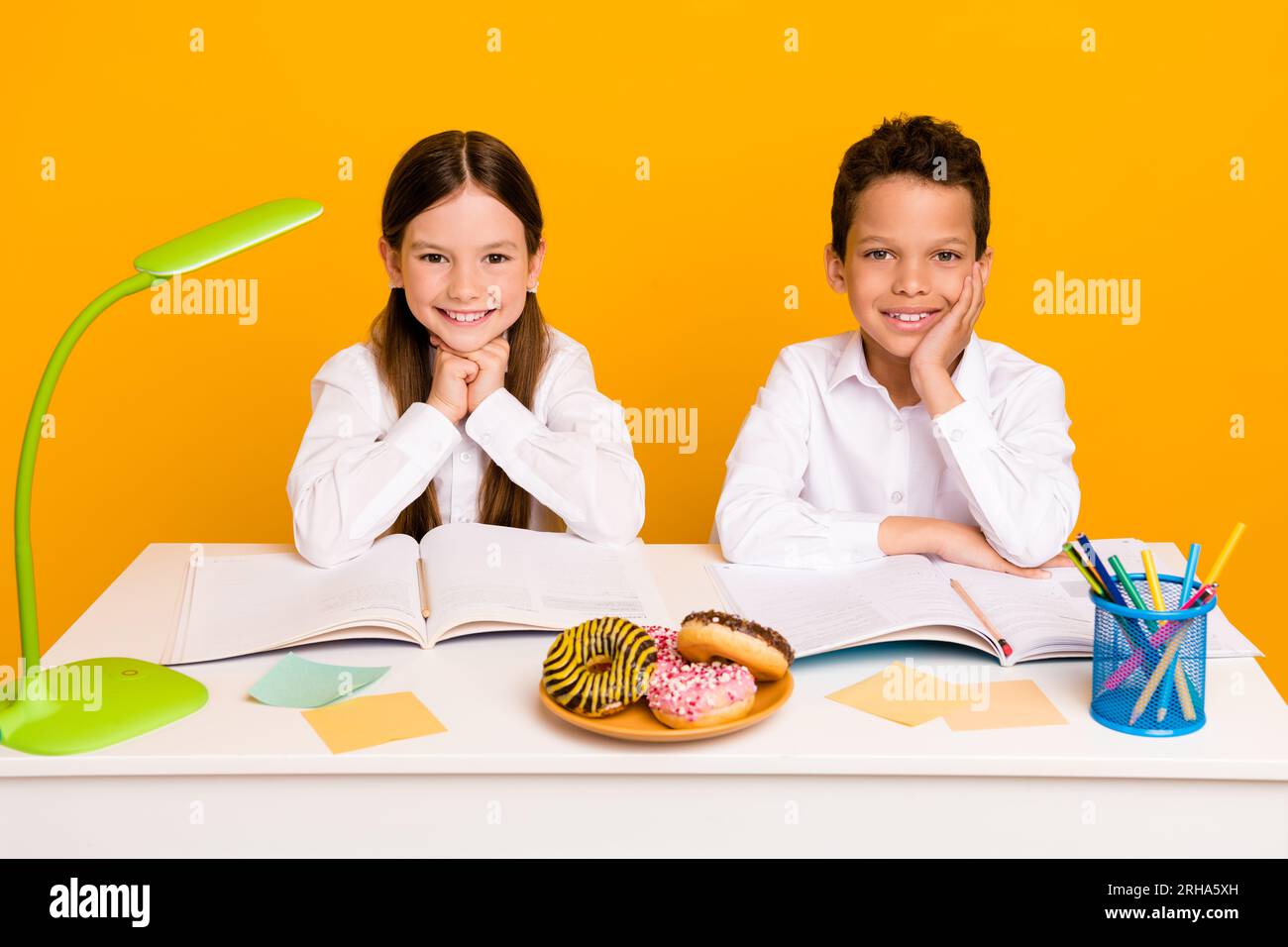 Photo of cute best school friends girl boy sit table curious learners ...