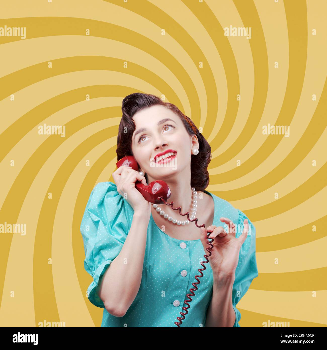 Vintage style woman holding the receiver and having a phone call, she ...
