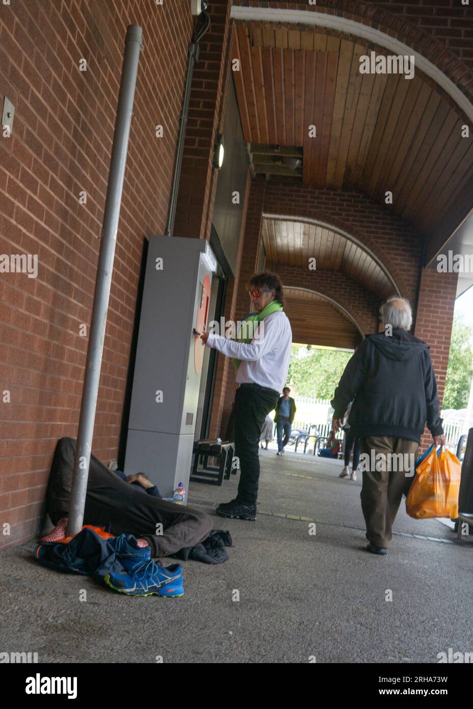Beggar outside Sainsbury's supermarket, Chiswick, London Stock Photo ...