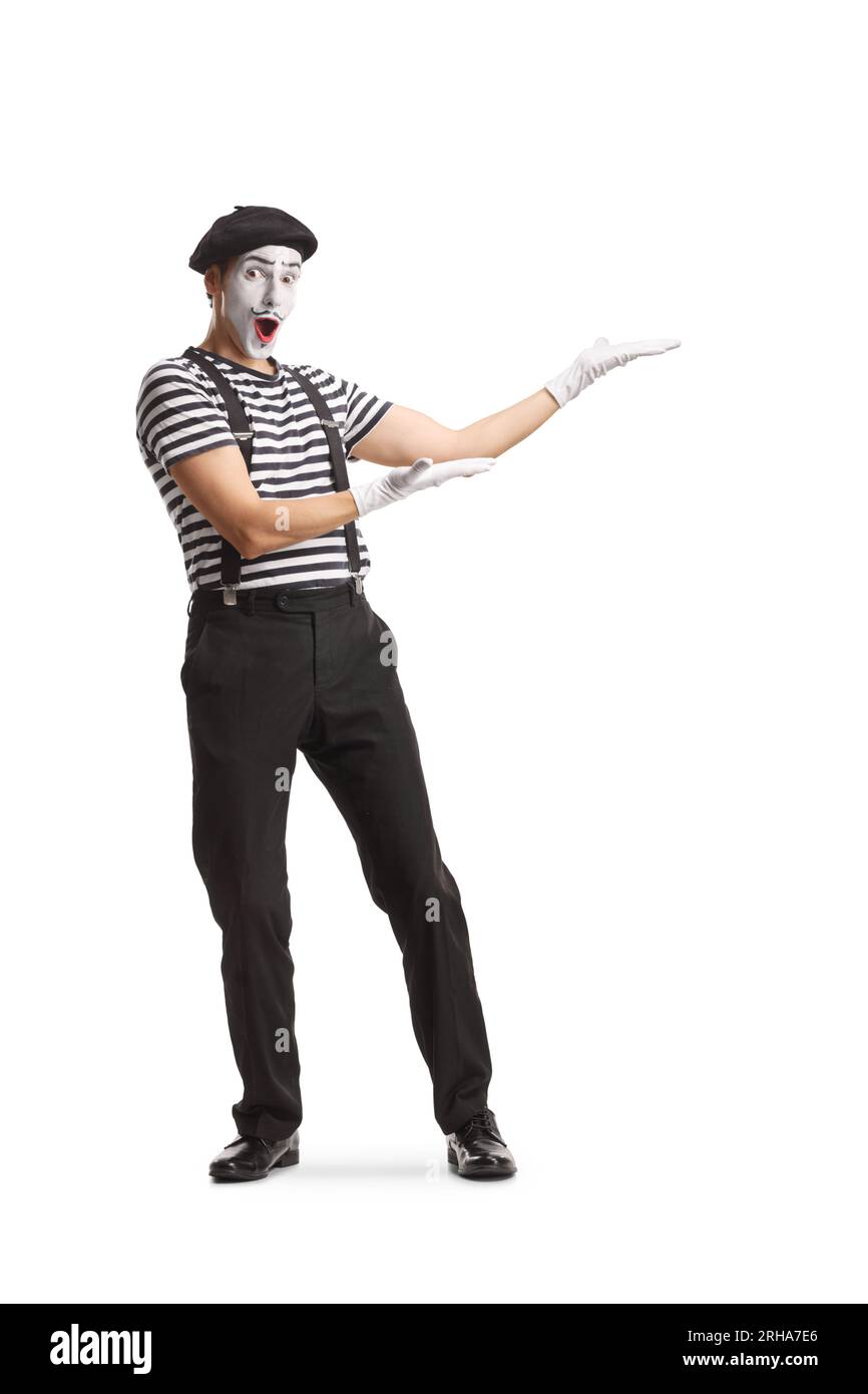 Full length portrait of a mime presenting isolated on white background ...