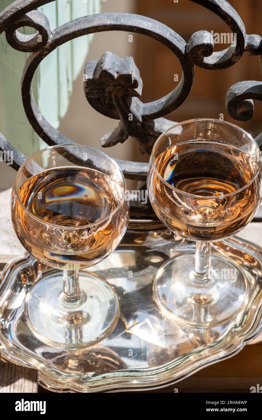 French cold rose dry wine from Provence in glasses served on window ...