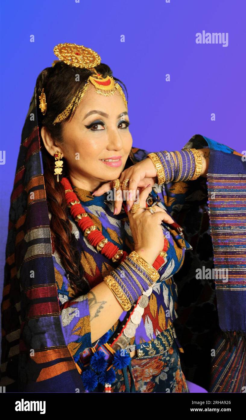 A Nepali Limbu woman in her traditional dress Stock Photo - Alamy
