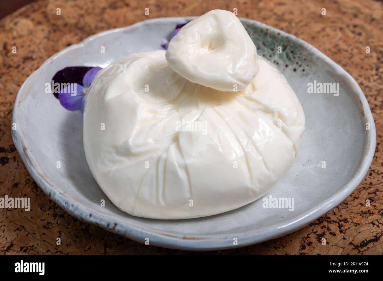 Fresh handmade soft Italian cheese from Puglia, white ball of burrata ...
