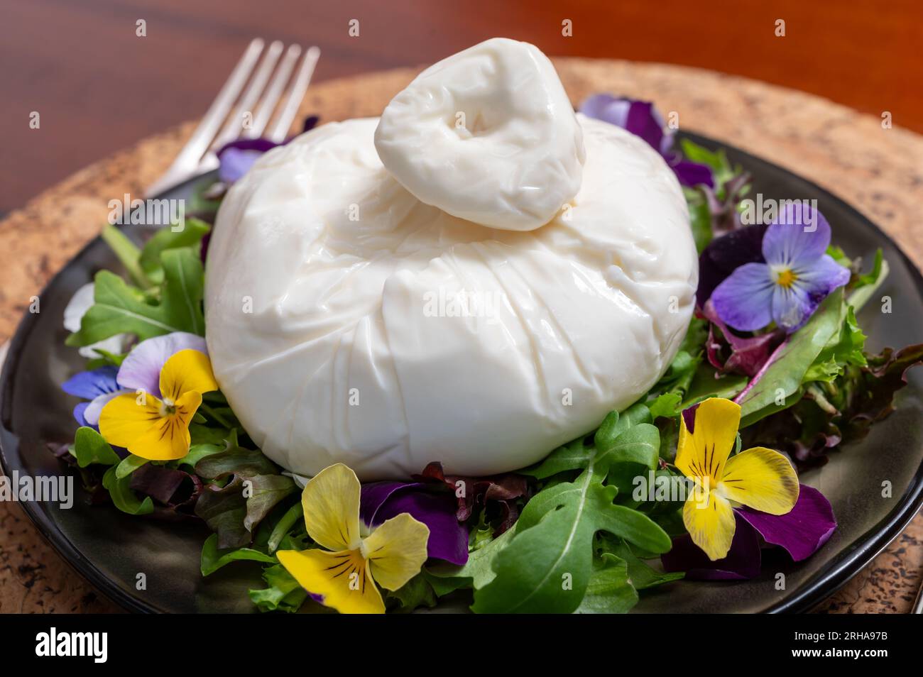 Fresh handmade soft Italian cheese from Puglia, white ball of burrata ...