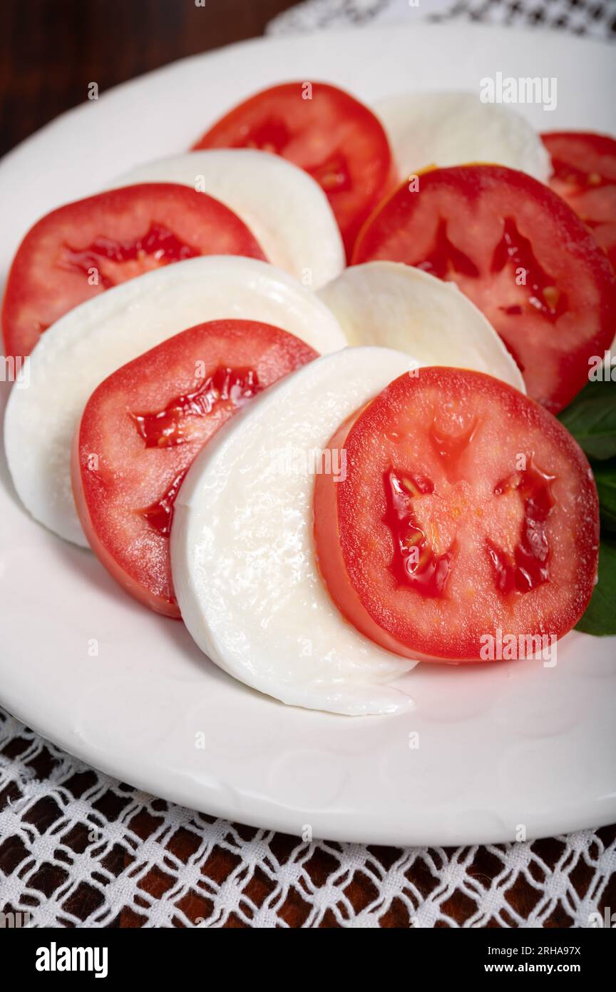 Itaian vegetarian food, fresh caprese salad made with white soft ...