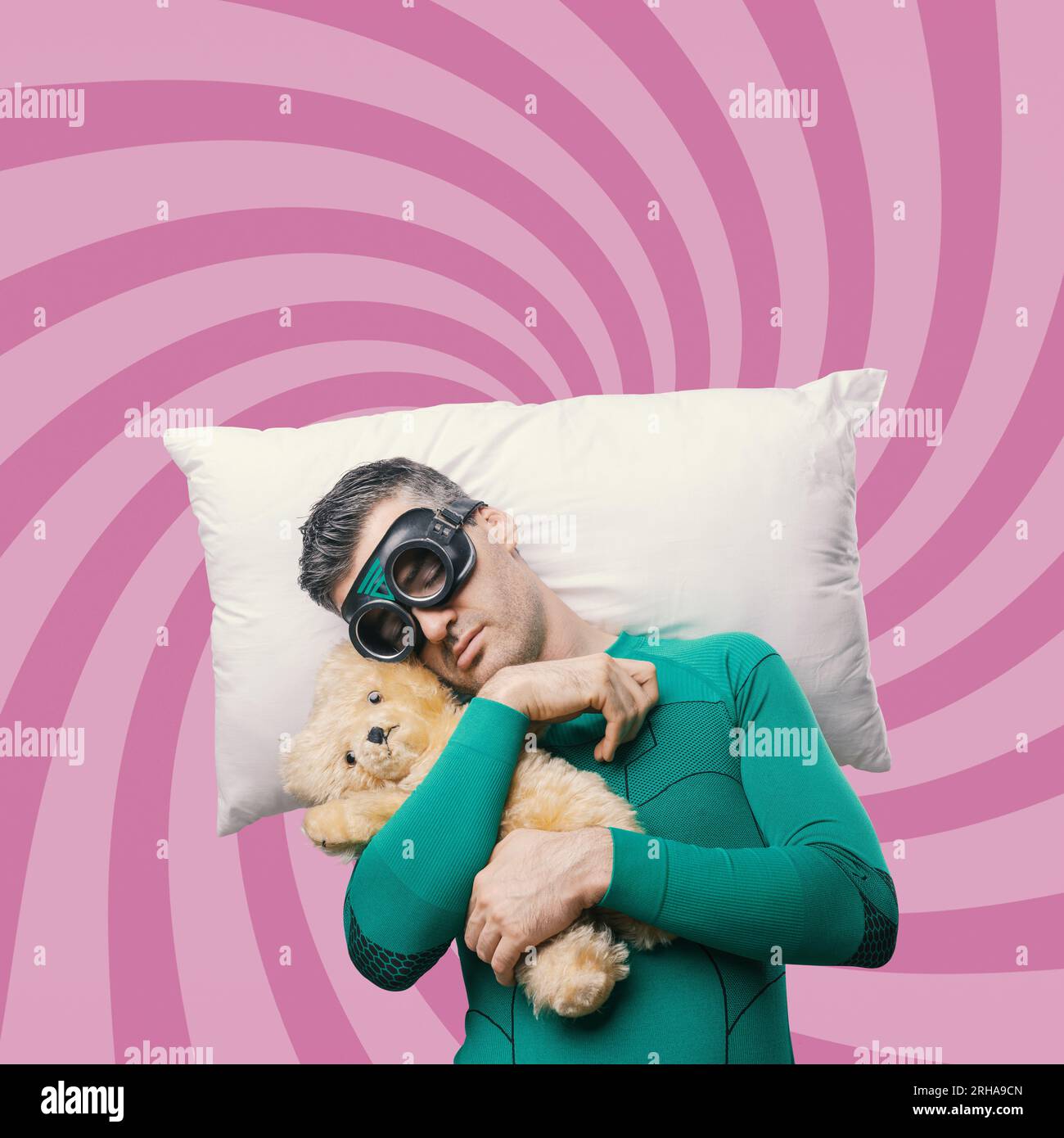 Superhero sleeping on pillow floating in the air with teddy bear Stock ...