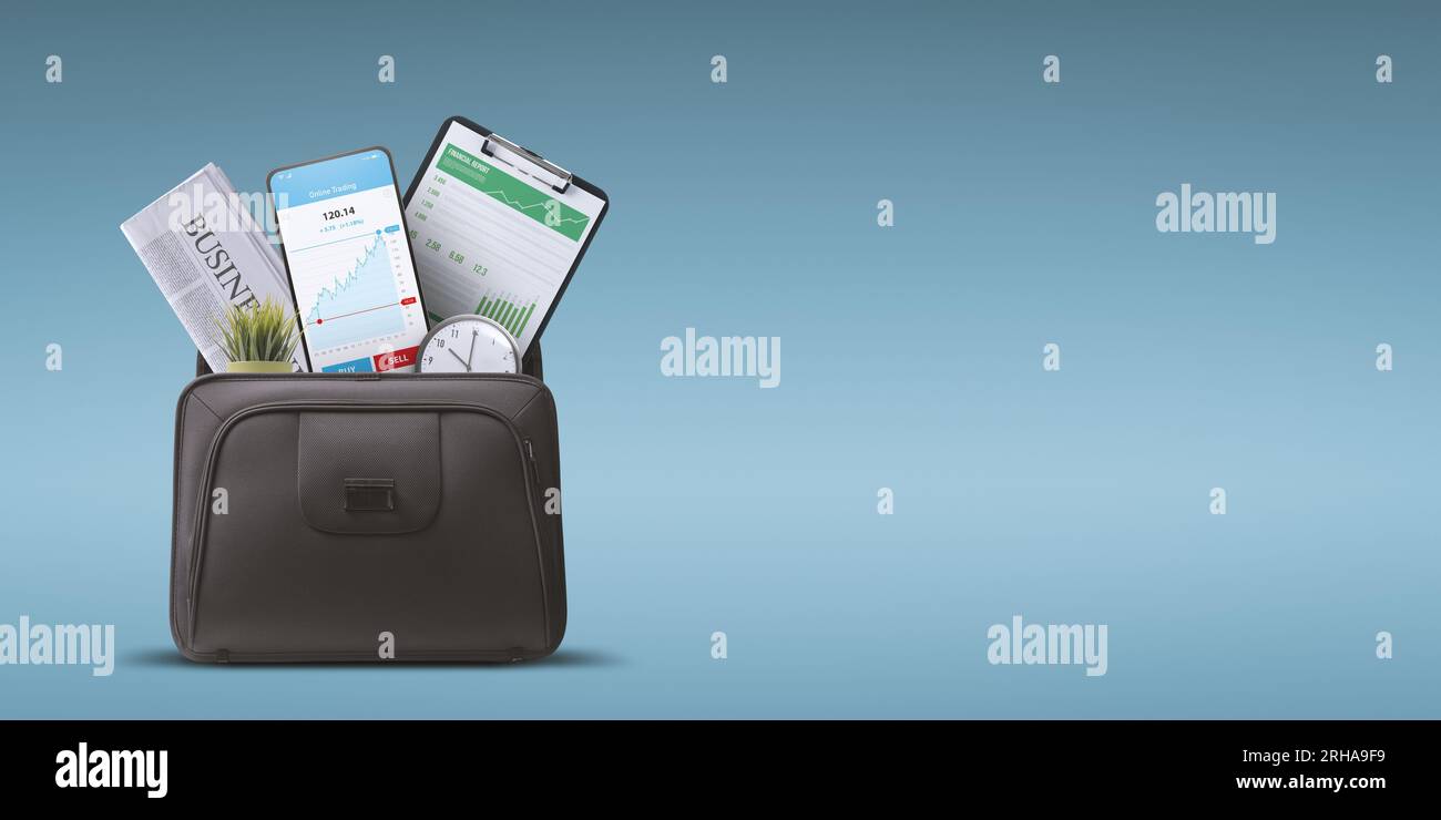 Financial graphs and business items in a briefcase: stock market ...