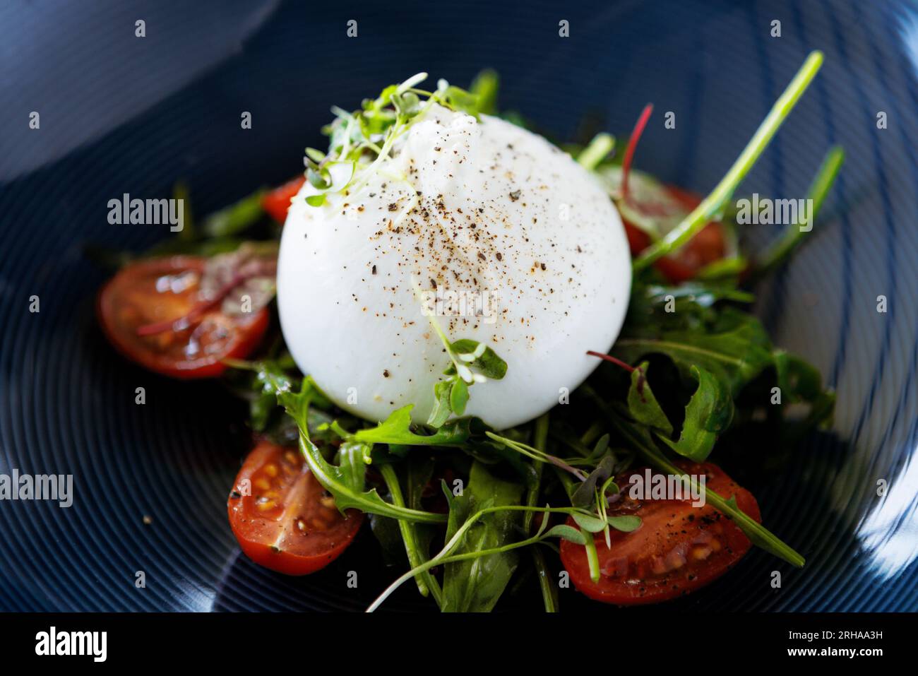 Burrata with paprika-truffle jam and cherry-cluster tomato salad ...