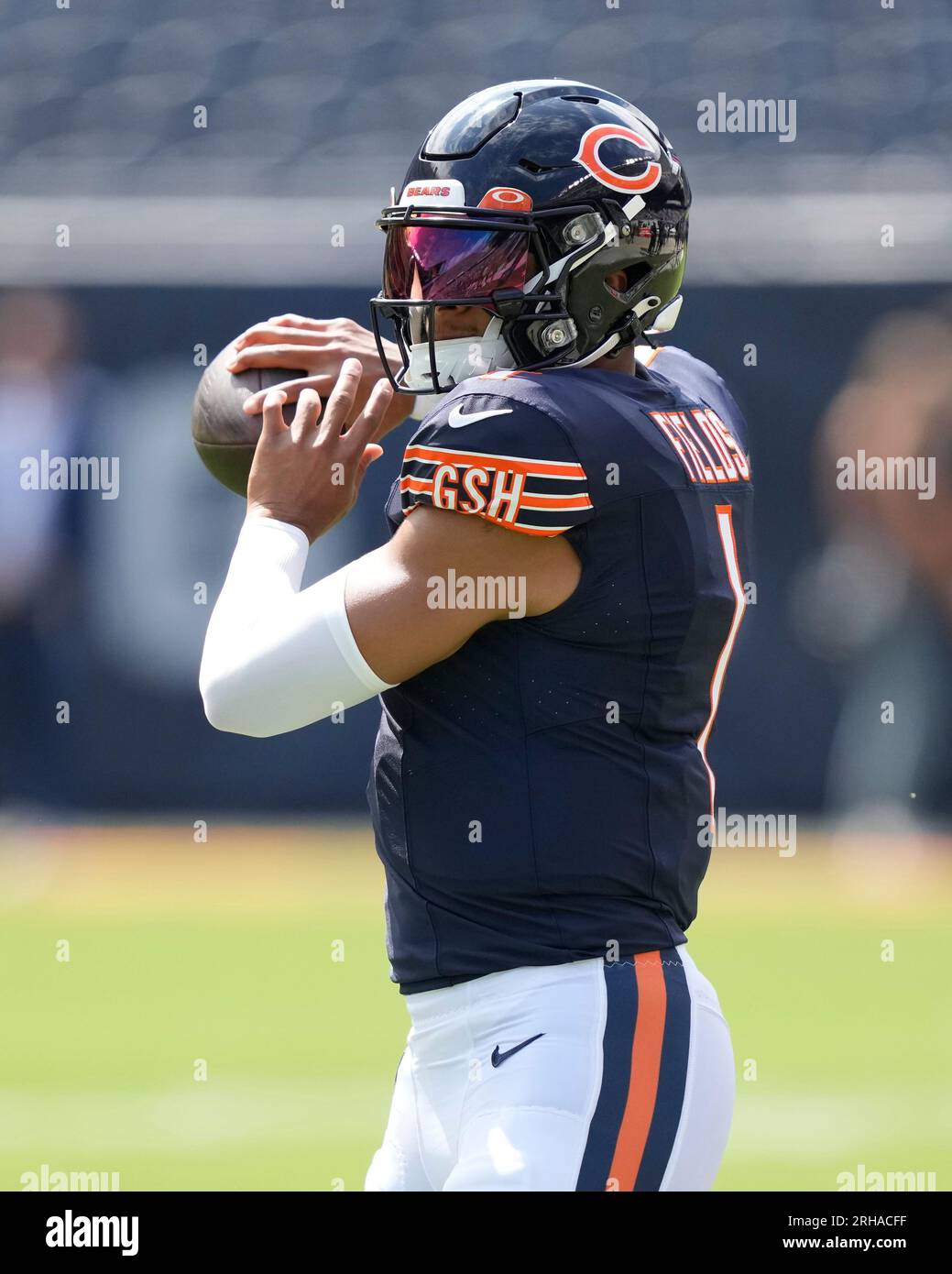 Chicago Bears quarterback Justin Fields warms up in an NFL preseason ...