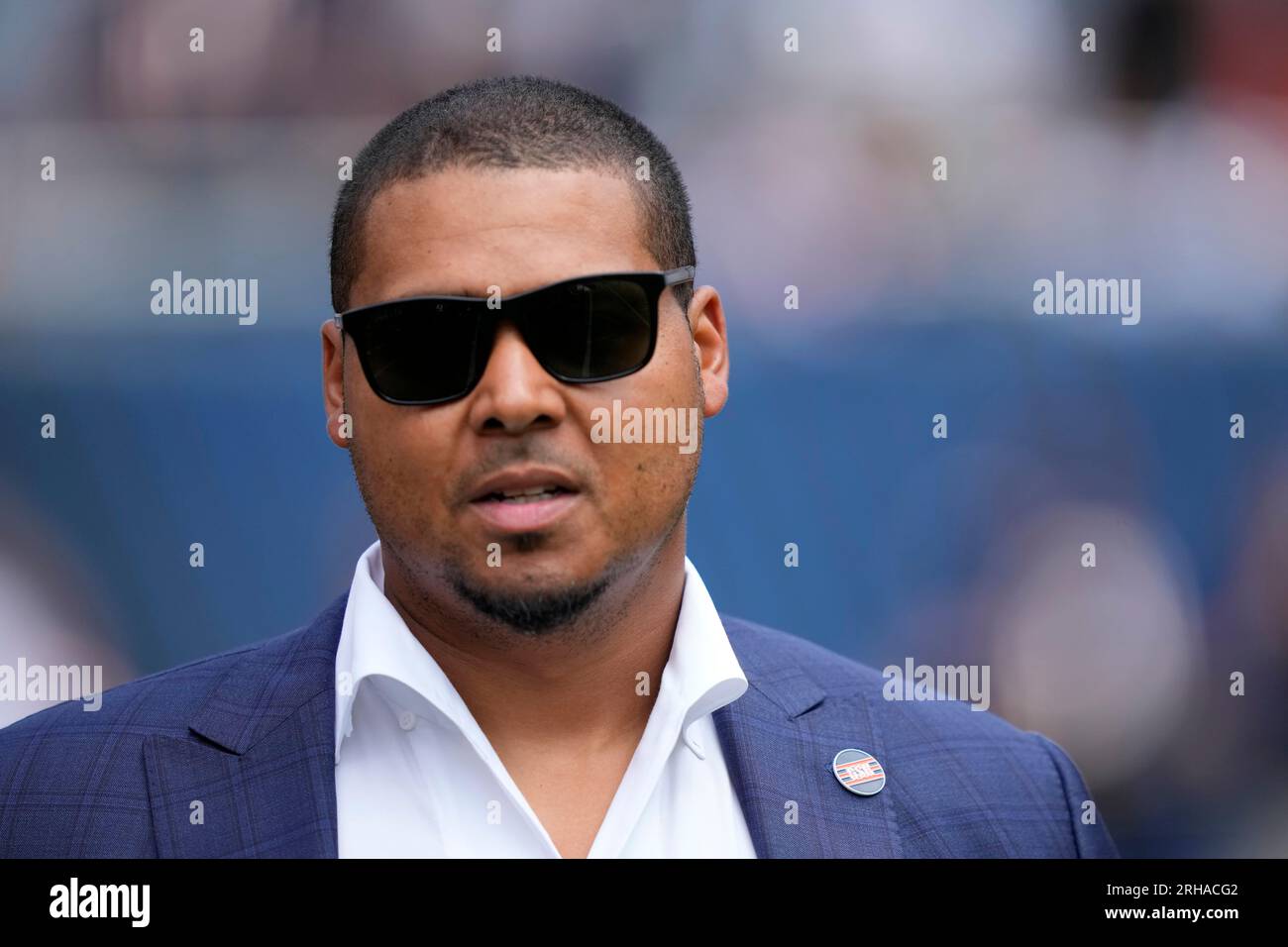 Chicago Bears General manager Ryan Poles walks the sidelines before an ...