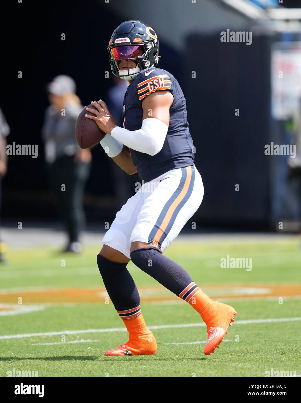 Chicago Bears quarterback Justin Fields warms up in an NFL preseason ...