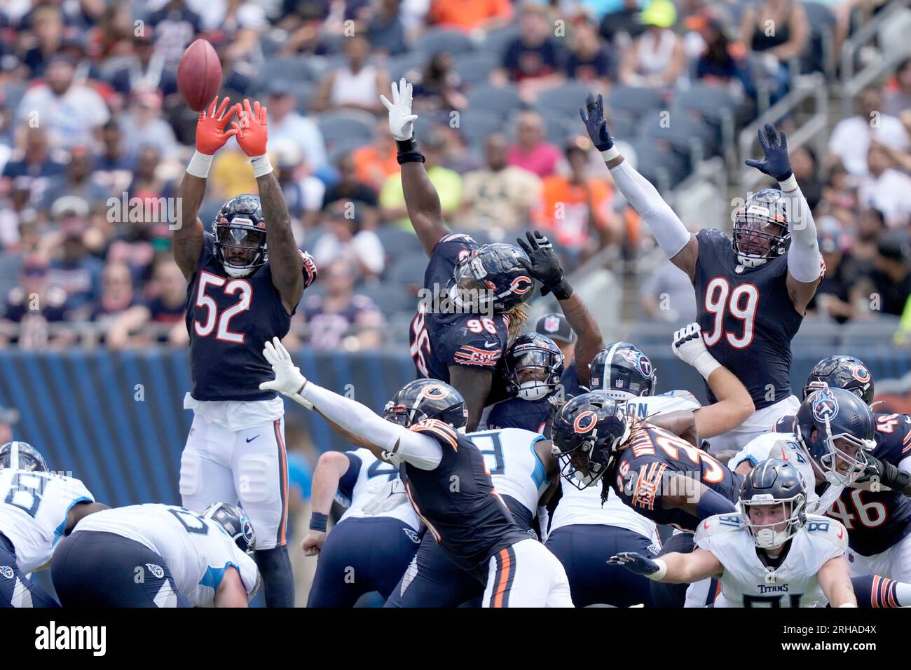 Chicago Bears linebacker Terrell Lewis (52) defensive tackle Zacch Pickens (96) and linebacker ...