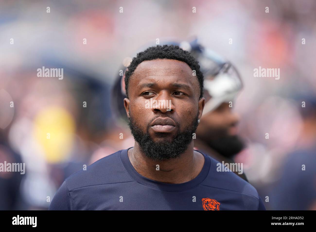Chicago Bears defensive end Yannick Ngakoue walks the sidelines in an ...