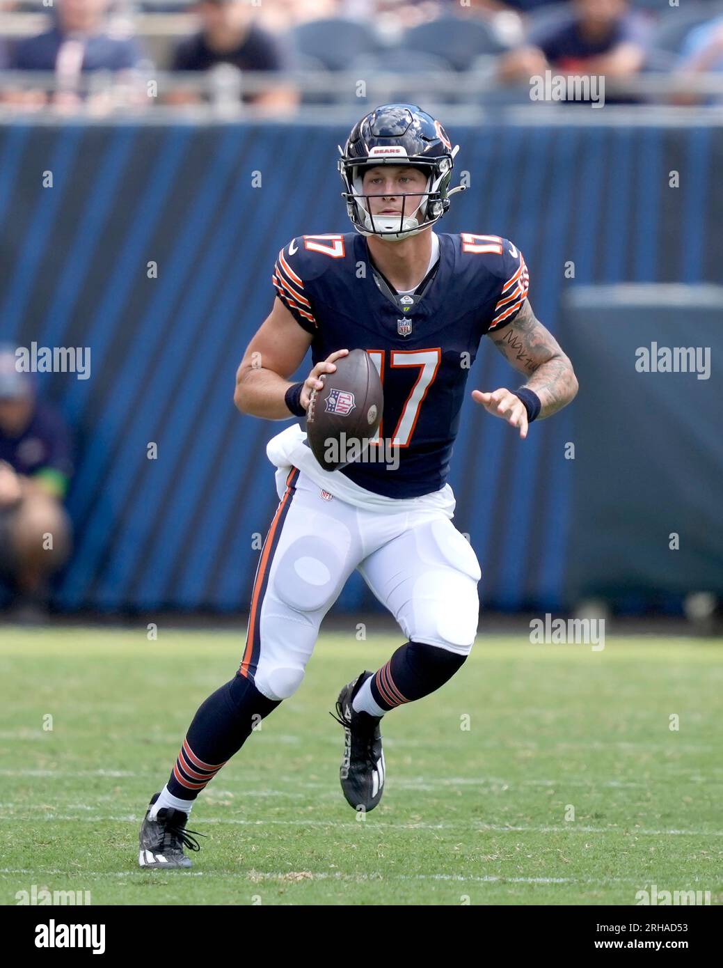 Chicago Bears quarterback Tyson Bagent rolls out in an NFL preseason ...