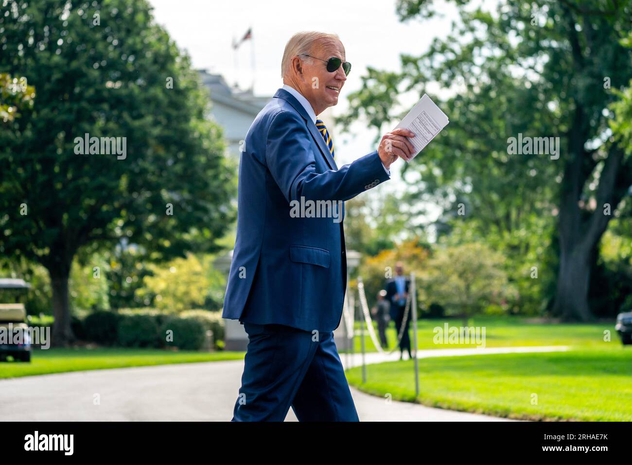 US President Joe Biden walks on the South Lawn of the White House ...